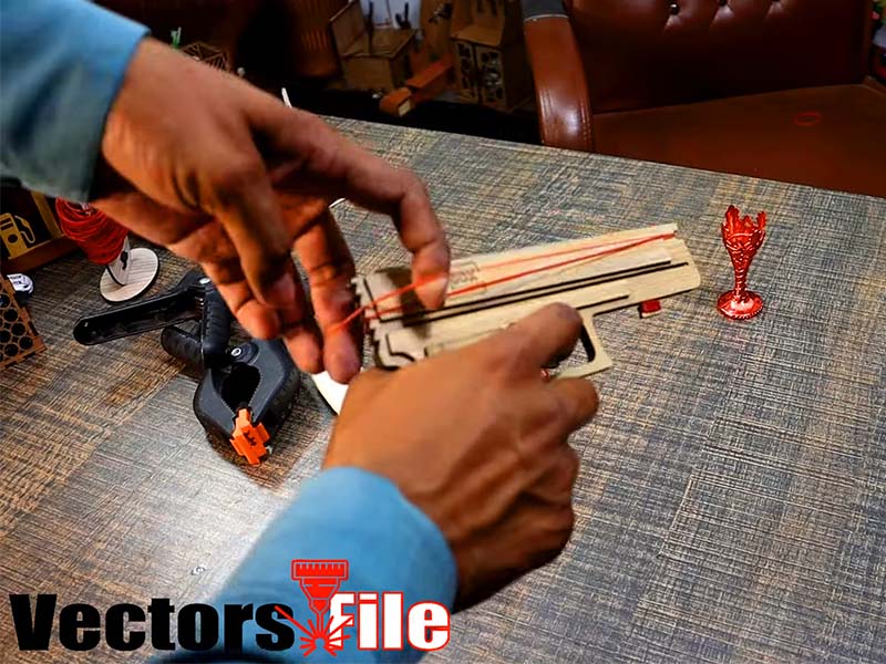 Laser Cut Mechanical Rubber Band Toy Gun Wooden Model Kit | Vectors File